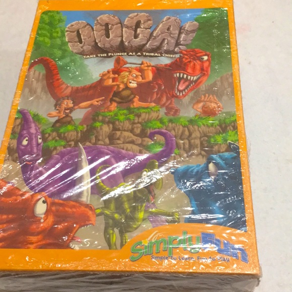 Simply Fun | Toys | Ooga Dinosaur Feeding Game Take A Plunge As A ...